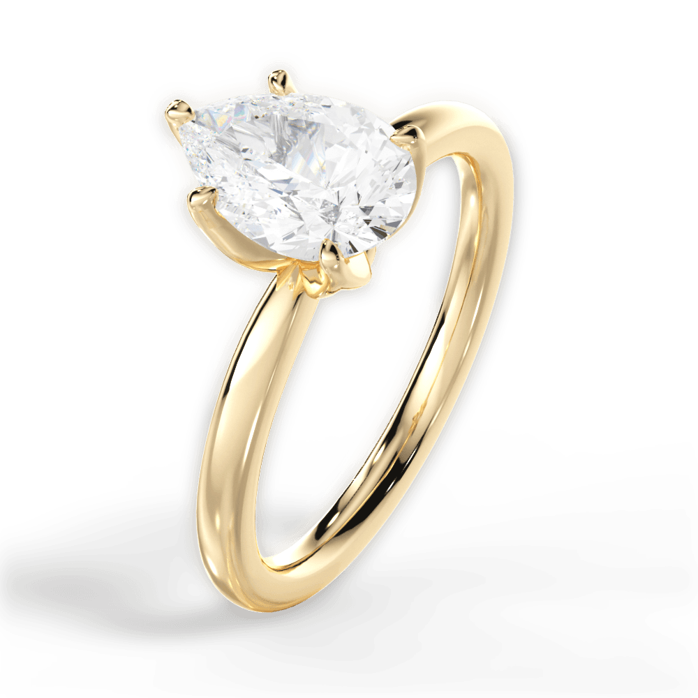 The Nivea Pear Cut 18kt Yellow Gold Petal Solitaire Engagement Ring ...